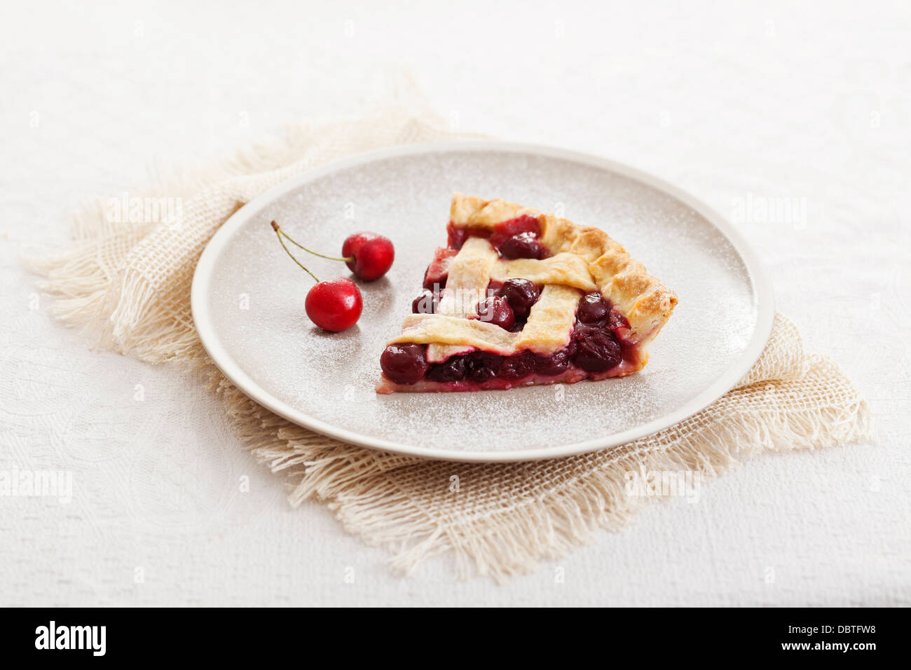 Piece of cherry pie with lattice crust Stock Photo - Alamy