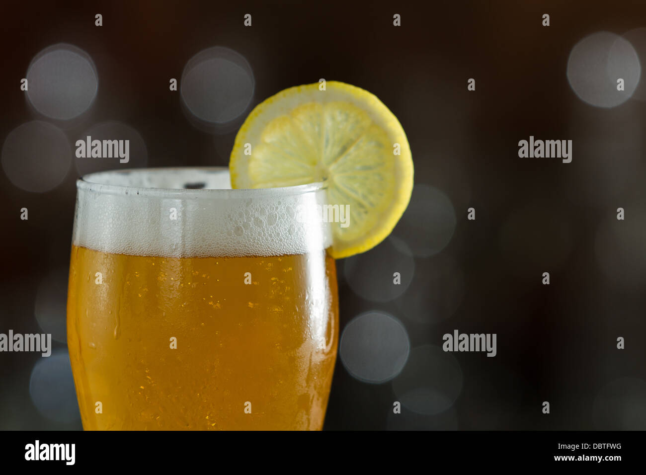 single beer served in a bar with an out of focus background Stock Photo ...