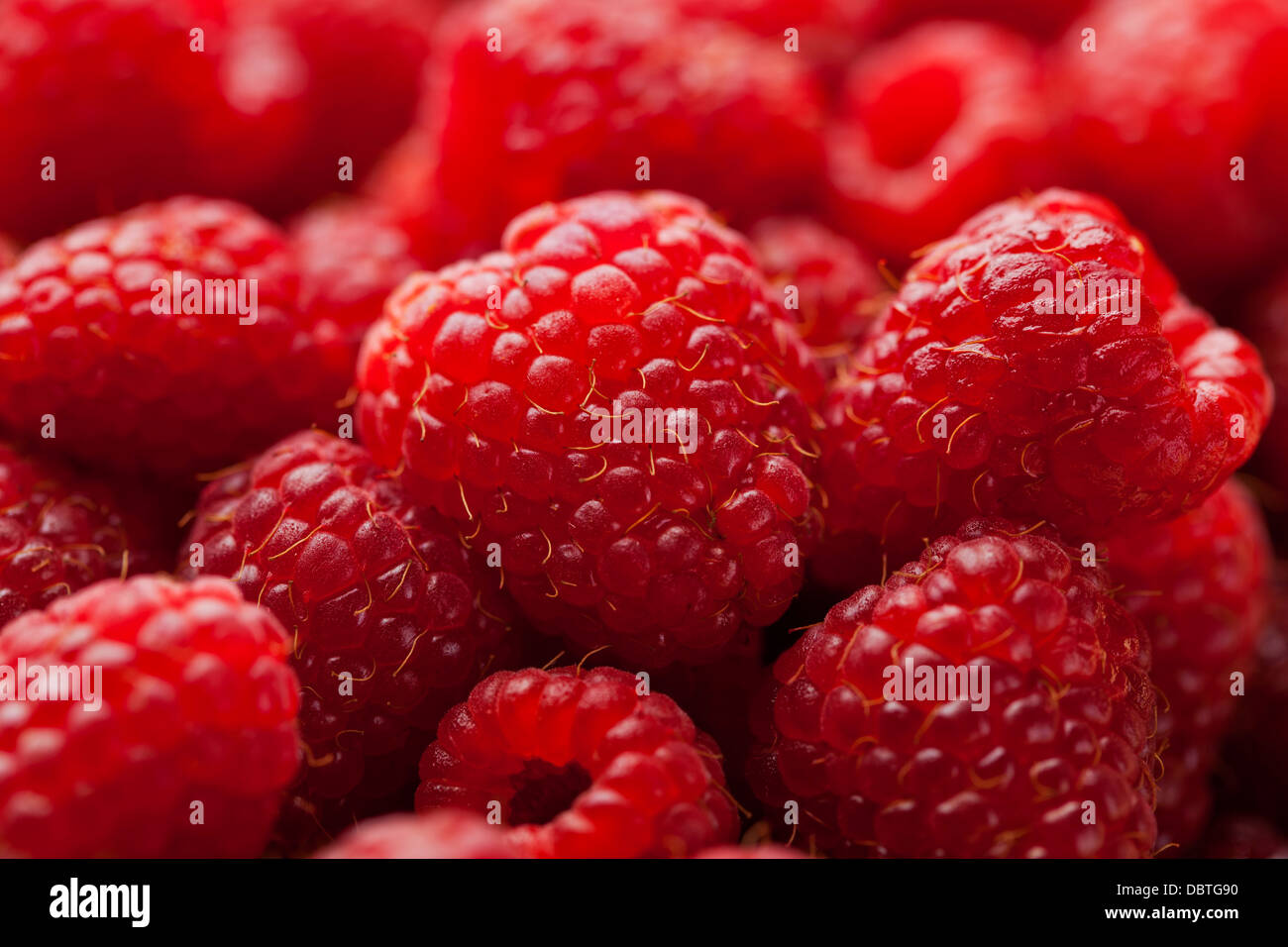 Red ripe fresh raspberry background Stock Photo - Alamy