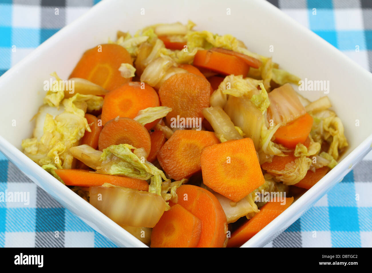 Bowl of stir fried chinese leaf and carrots in soy sauce Stock Photo ...