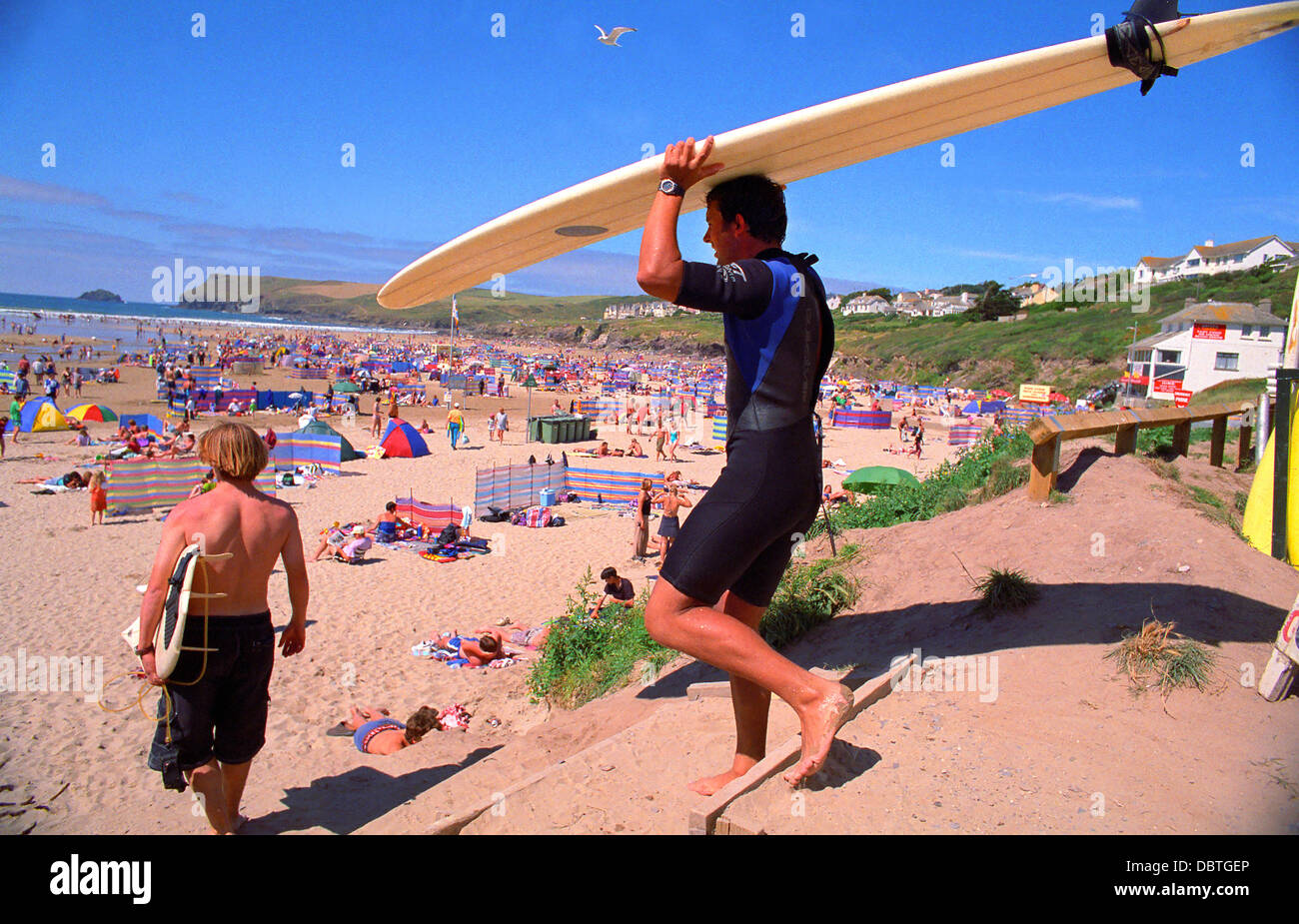 Off to surf at Polzeath in Cornwall, UK Stock Photo - Alamy