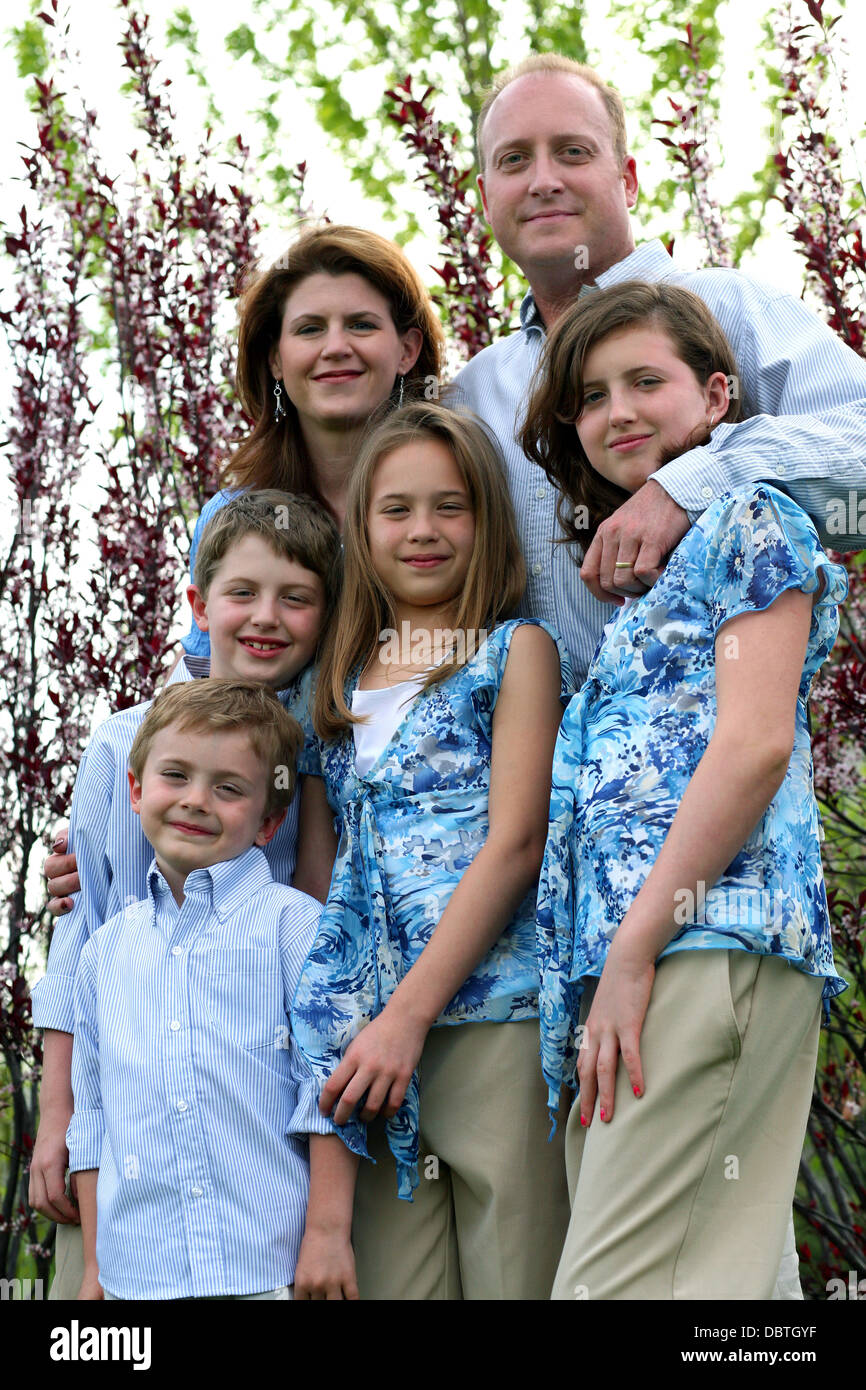 attractive caucasian family of 6 outside smiling Stock Photo - Alamy