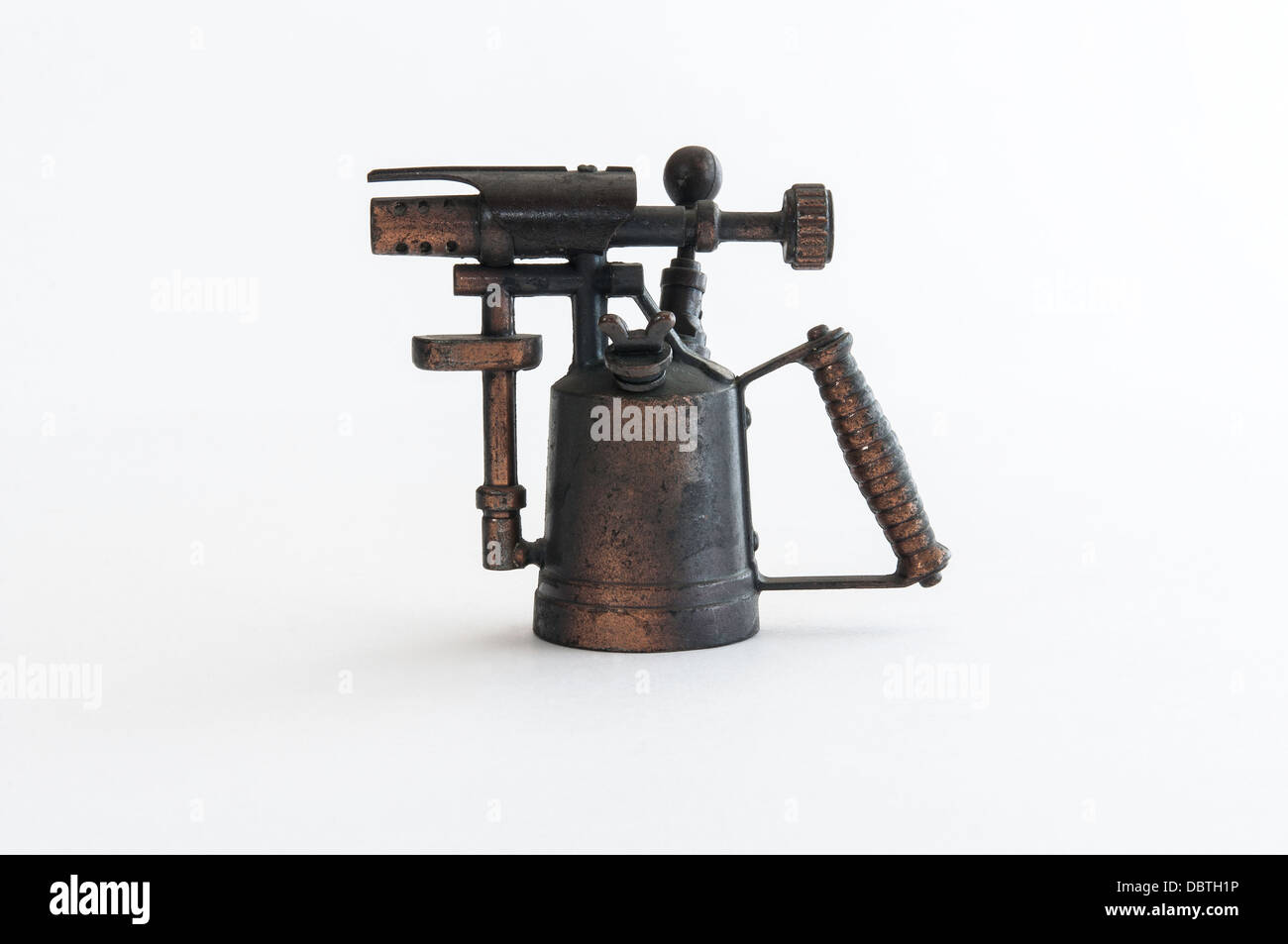 Oil lamp pencil copperish chrome sharpener Stock Photo - Alamy