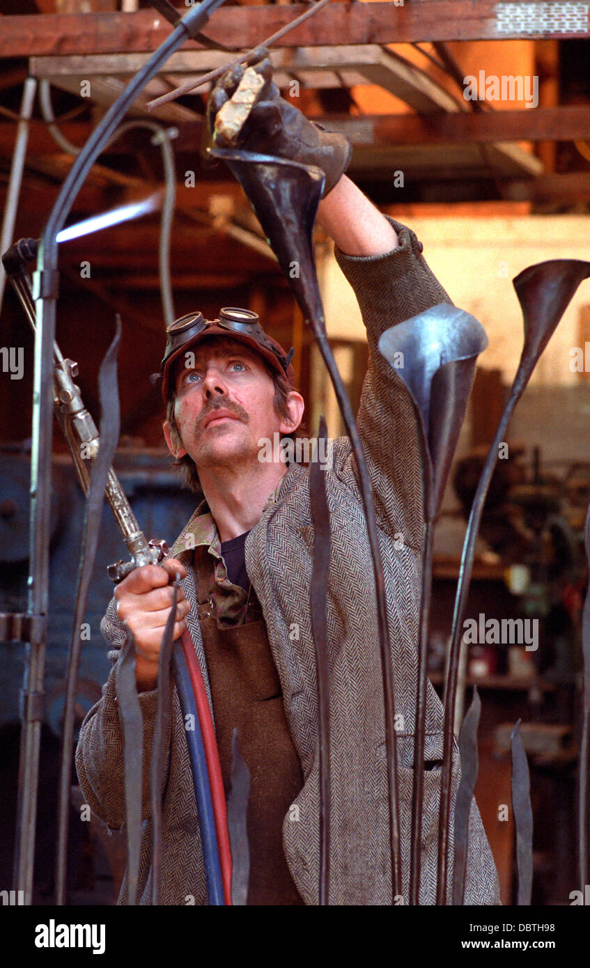 Blacksmith making ornate gates Stock Photo - Alamy