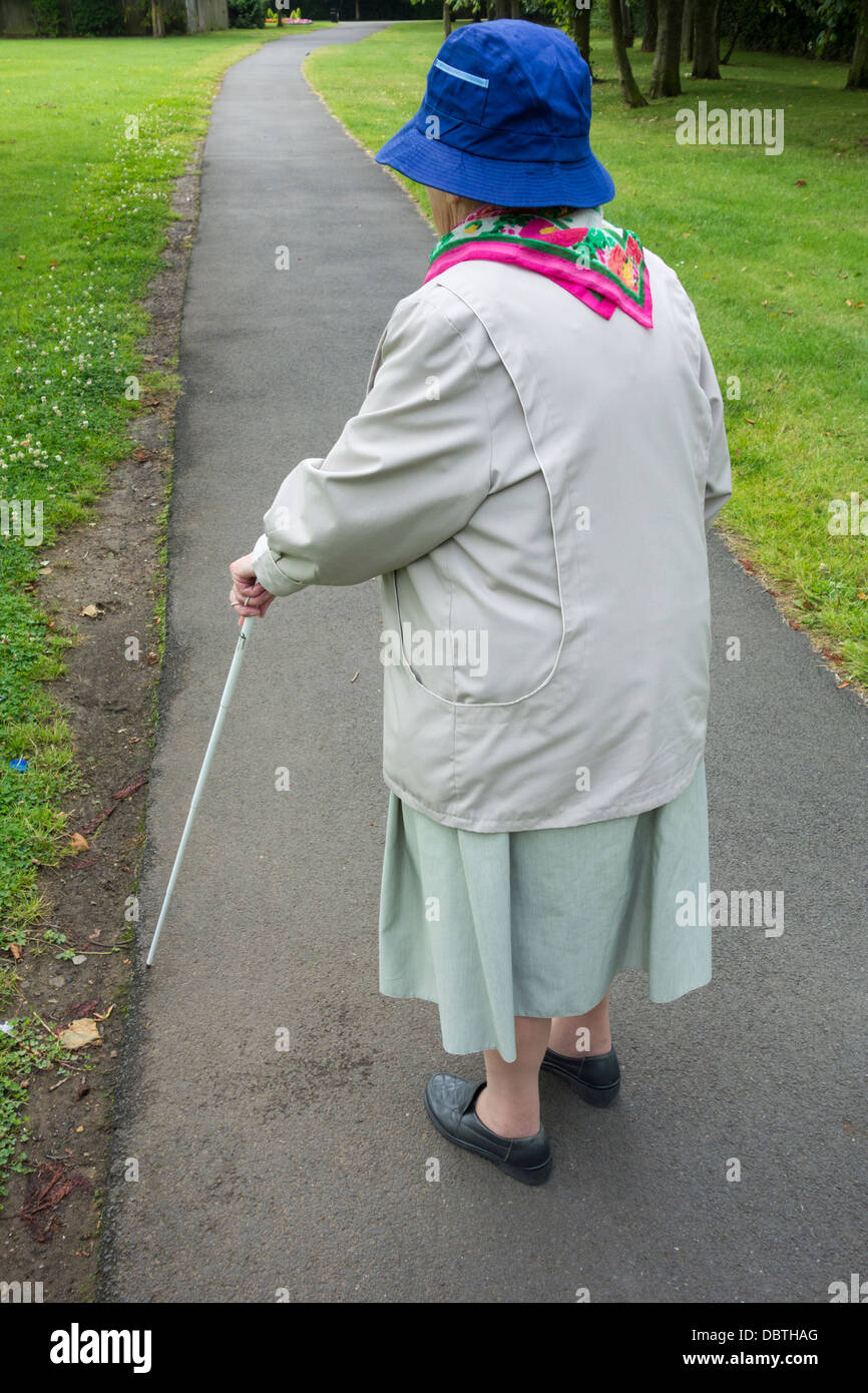 Old lady walking stick hi-res stock photography and images - Alamy