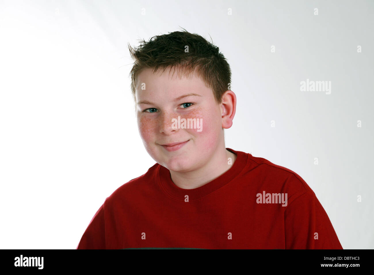 portrait of husky boy with freckles smiling Stock Photo - Alamy