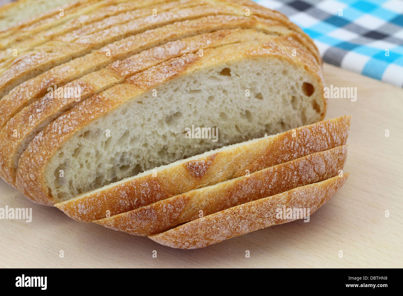 Rustic bread sliced, close up Stock Photo - Alamy