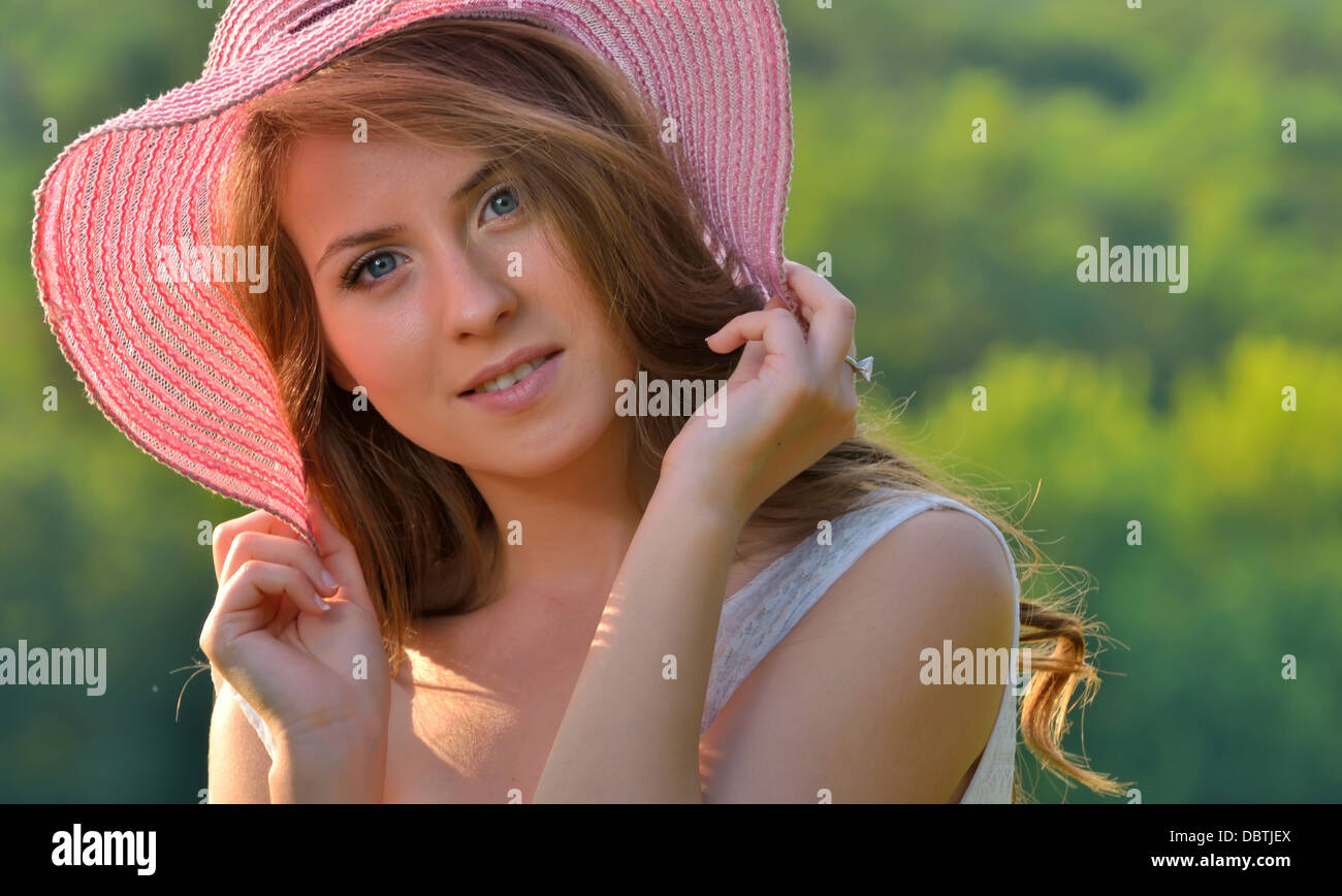 Portrait of pretty cheerful girl in nature Stock Photo - Alamy