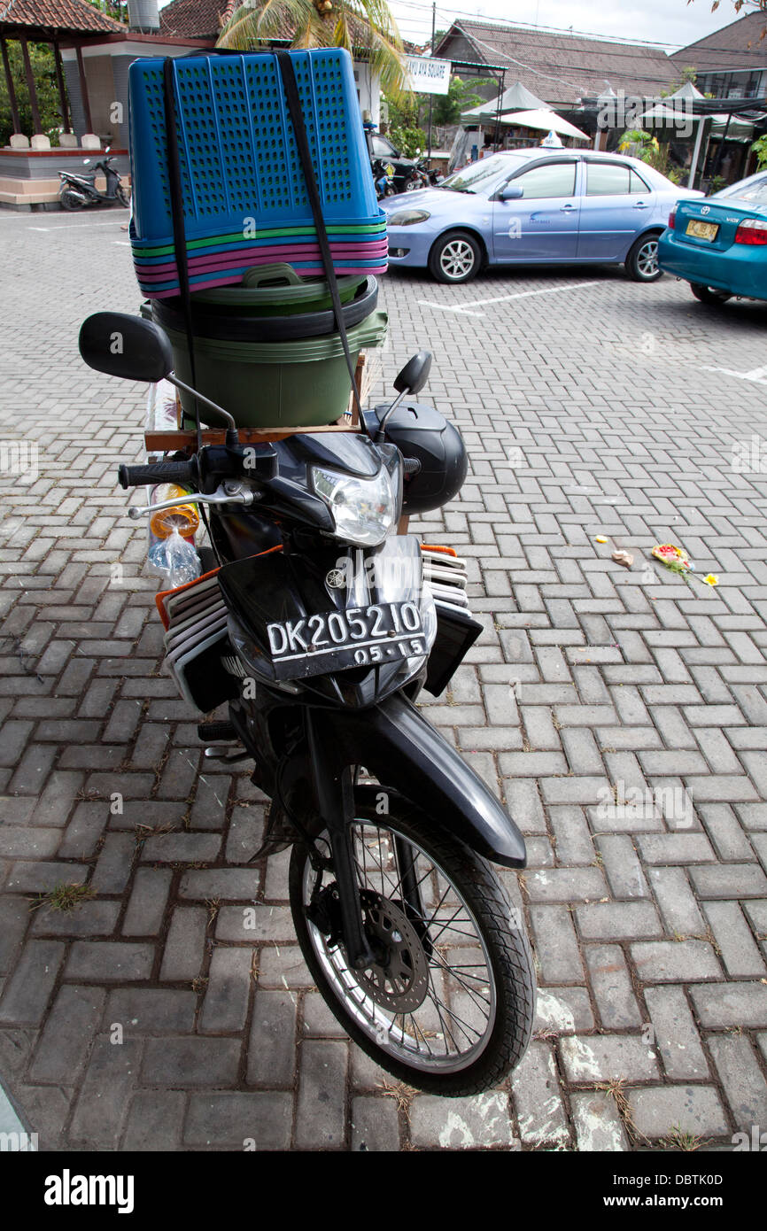 Motorbike loaded up with goods, Kayu AYA SQUARE, Seminyak, Bali ...