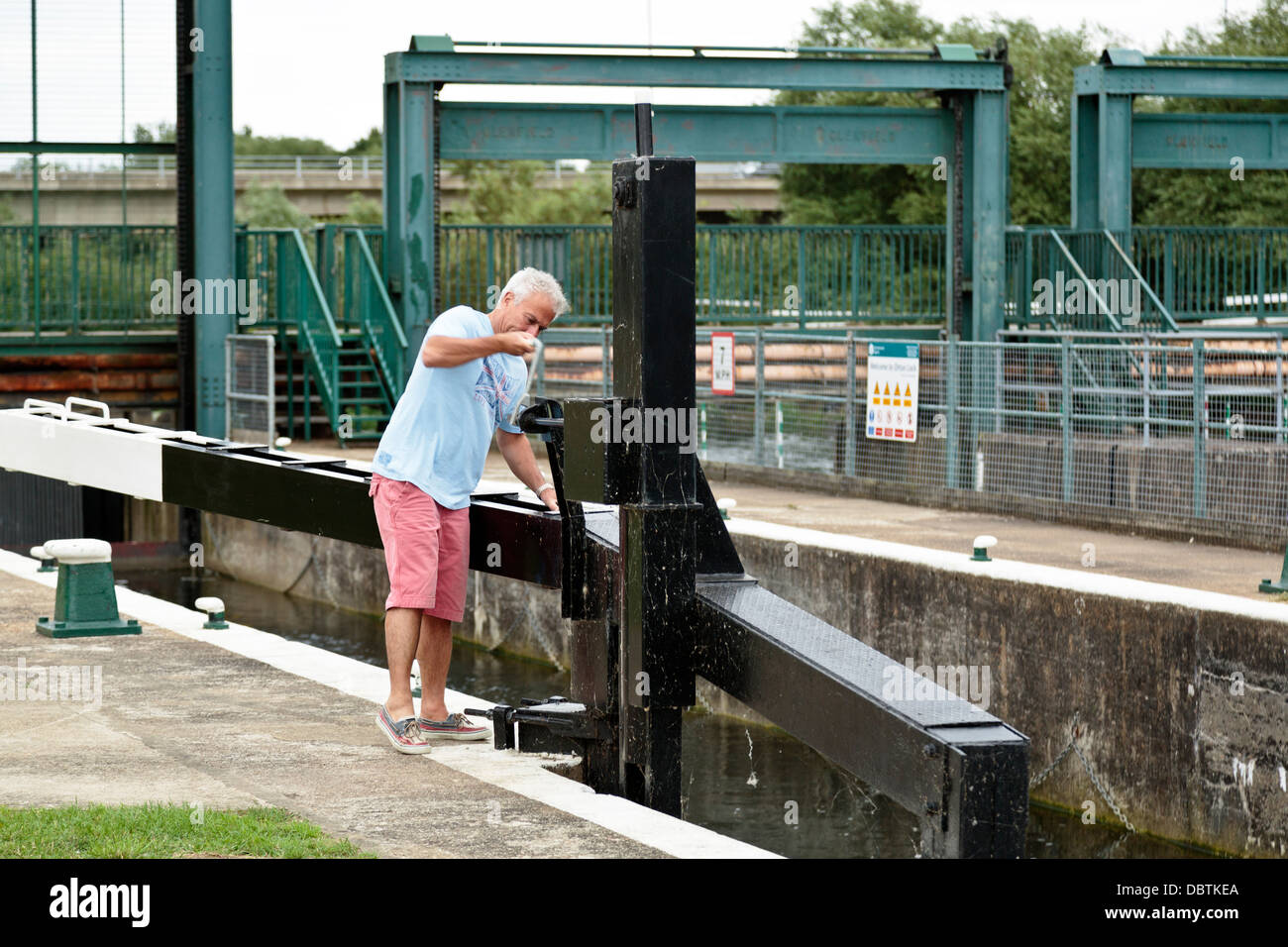 Man operating the Lock on the River Nene at Orton, Peterborough ...