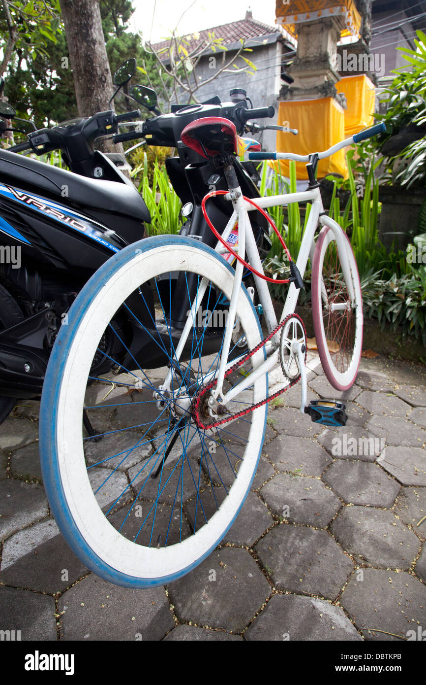 Bicycle With Motorbike, Seminyak, Bali, Indonesia Stock Photo - Alamy