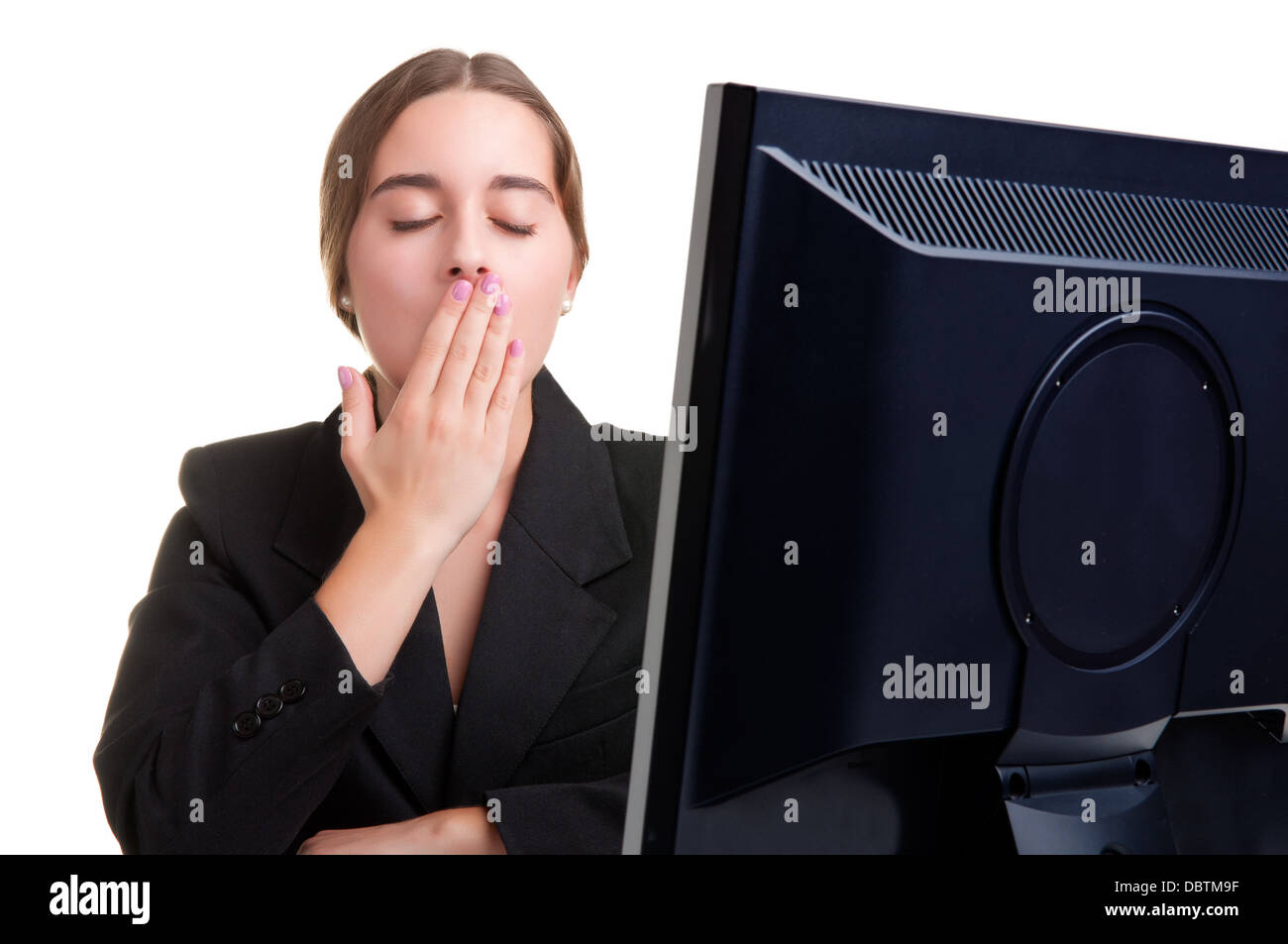 Sleepy businesswoman in a desk, in front of a computer, isolated in ...