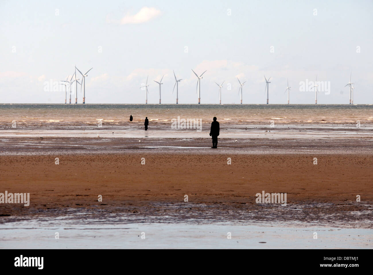 Liverpool Bay Wind Farm behind the figures of Another Place art work by ...