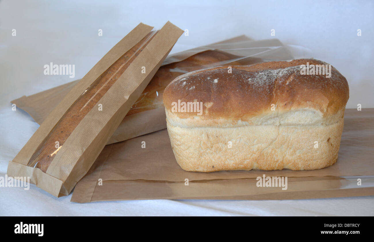 Fresh bread sticks and tin loaf Stock Photo - Alamy