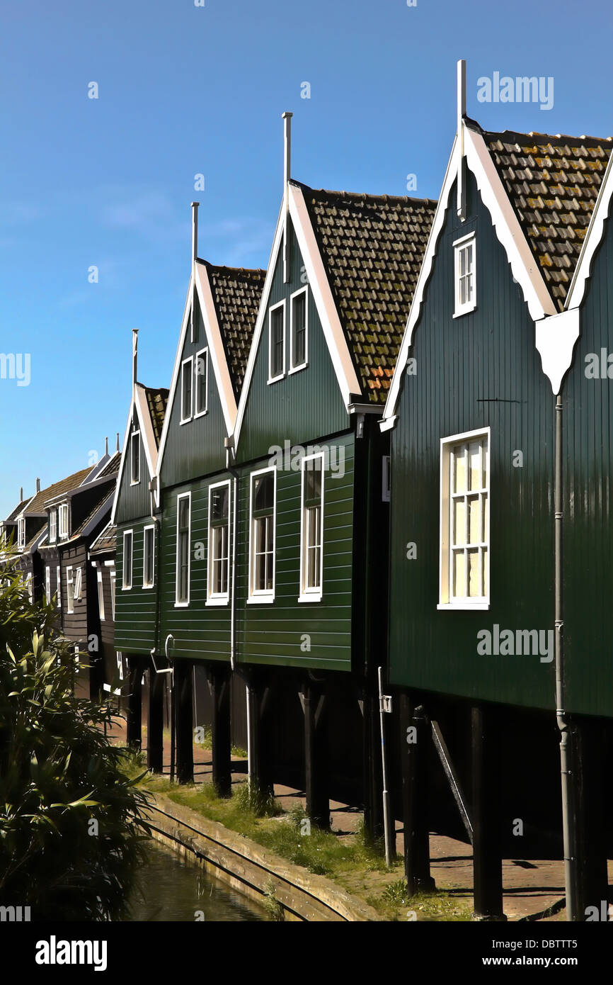 Marken, a historic village with its dark green wooden houses, built on ...