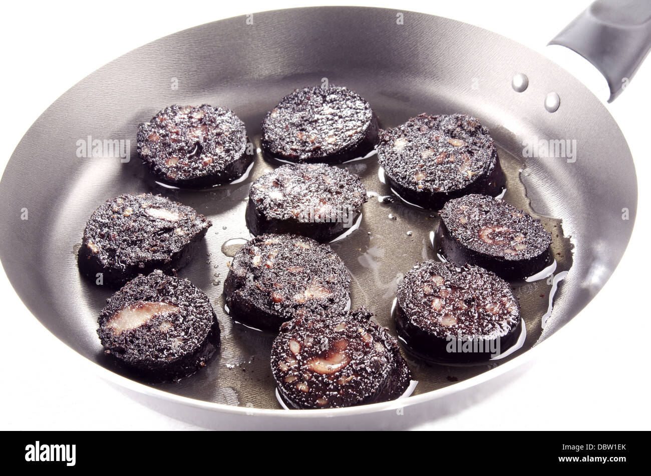 grilled irish black pudding in a pan Stock Photo - Alamy