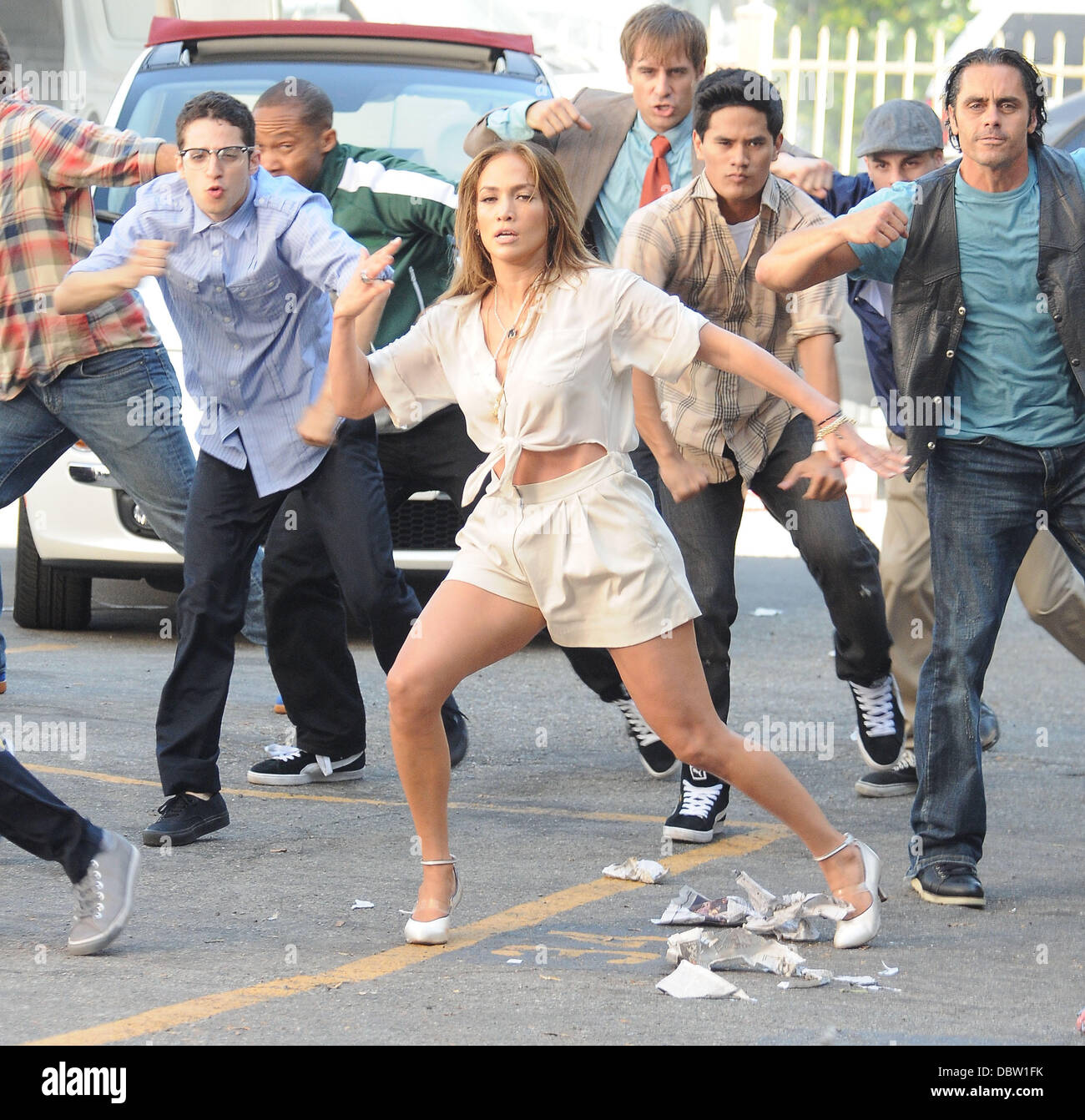 Jennifer Lopez performs a dance routine with backing dancers on a film ...