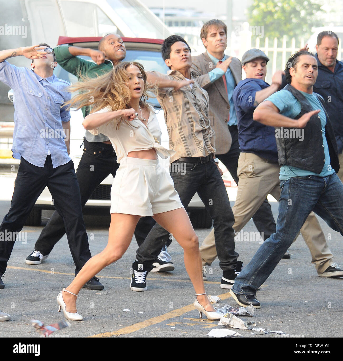 Jennifer Lopez performs a dance routine with backing dancers on a film ...