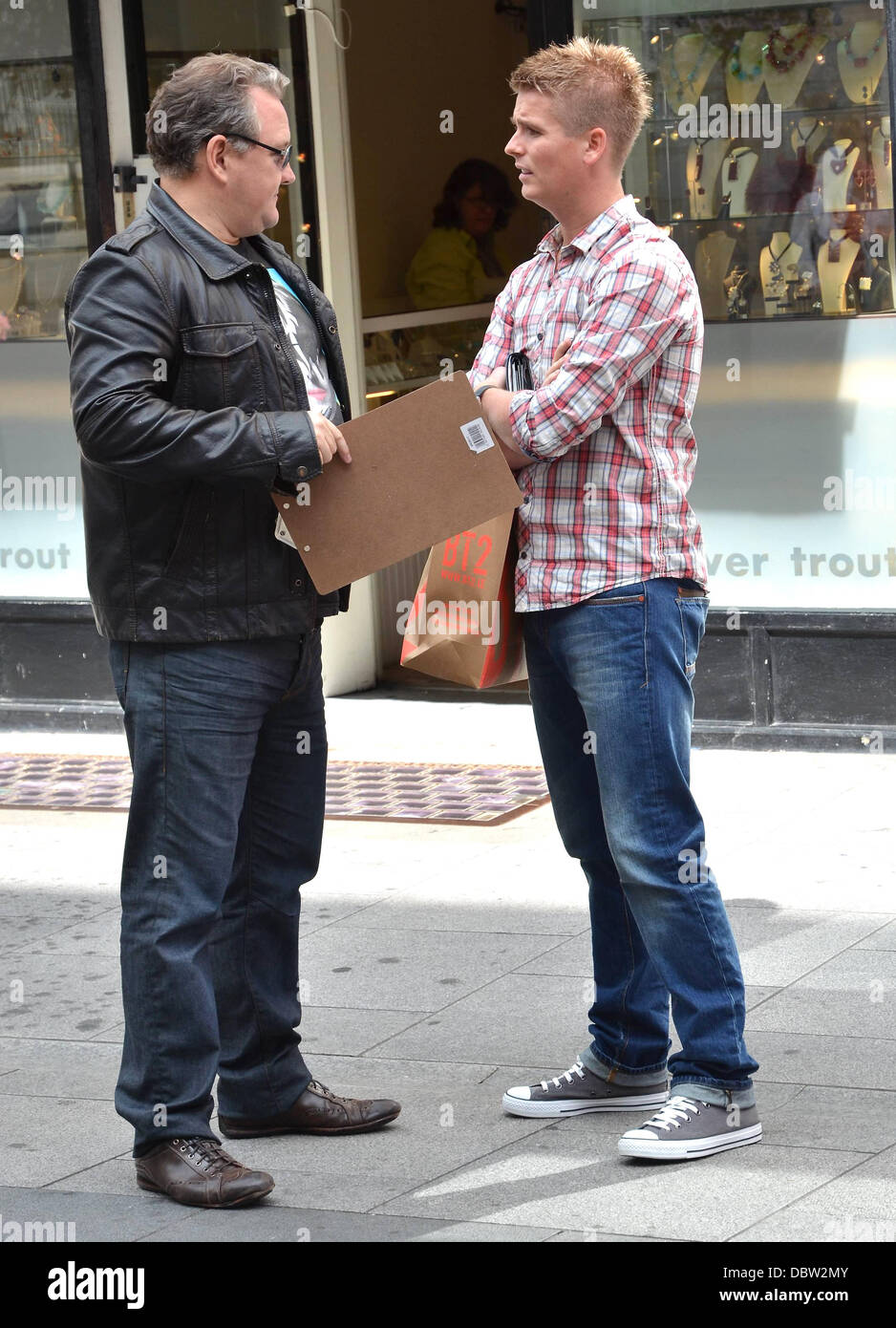 Stephen McCormack and Brian Ormond outside Harry's Bar filming scenes ...