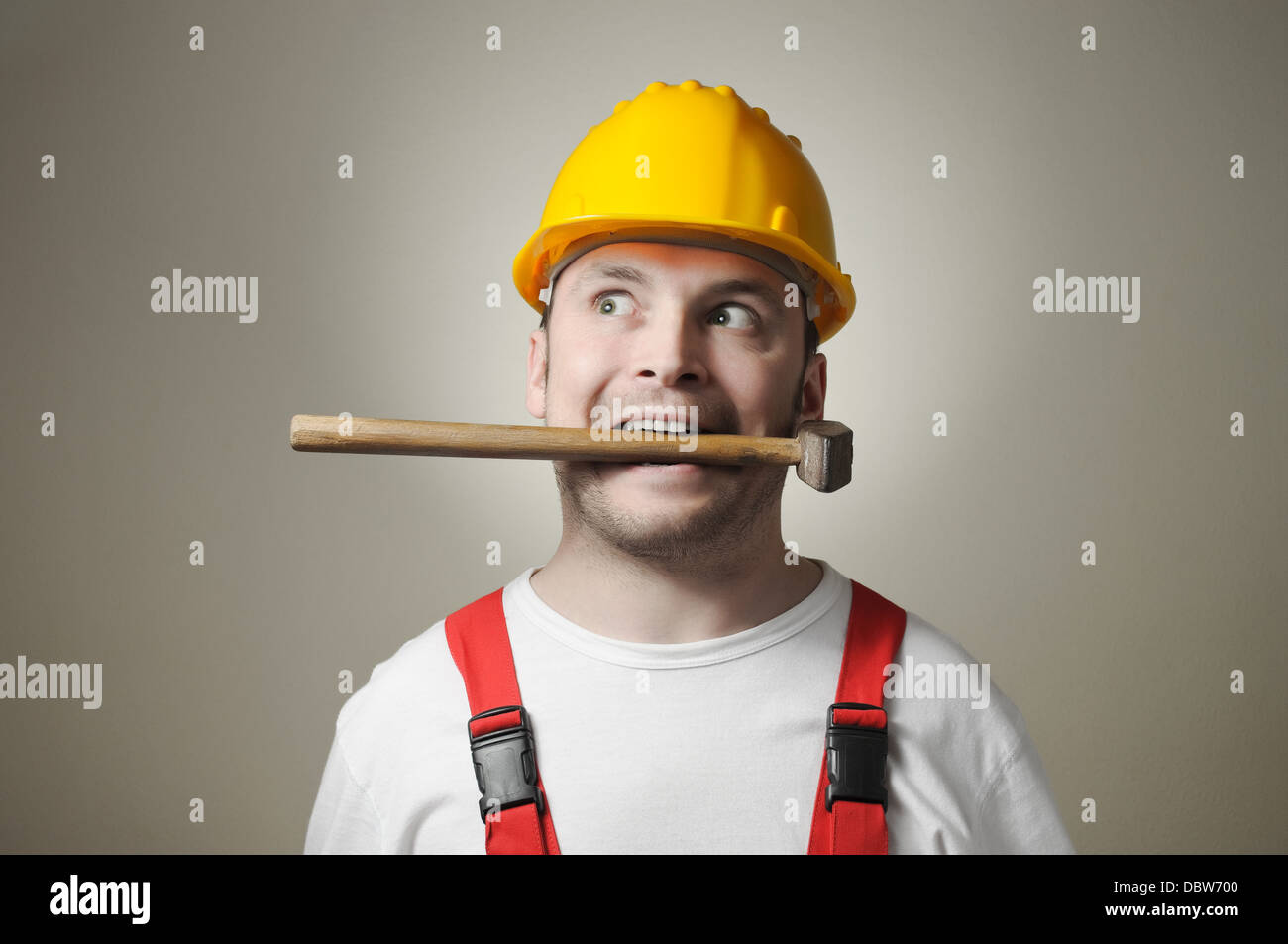 Insane young worker Stock Photo - Alamy