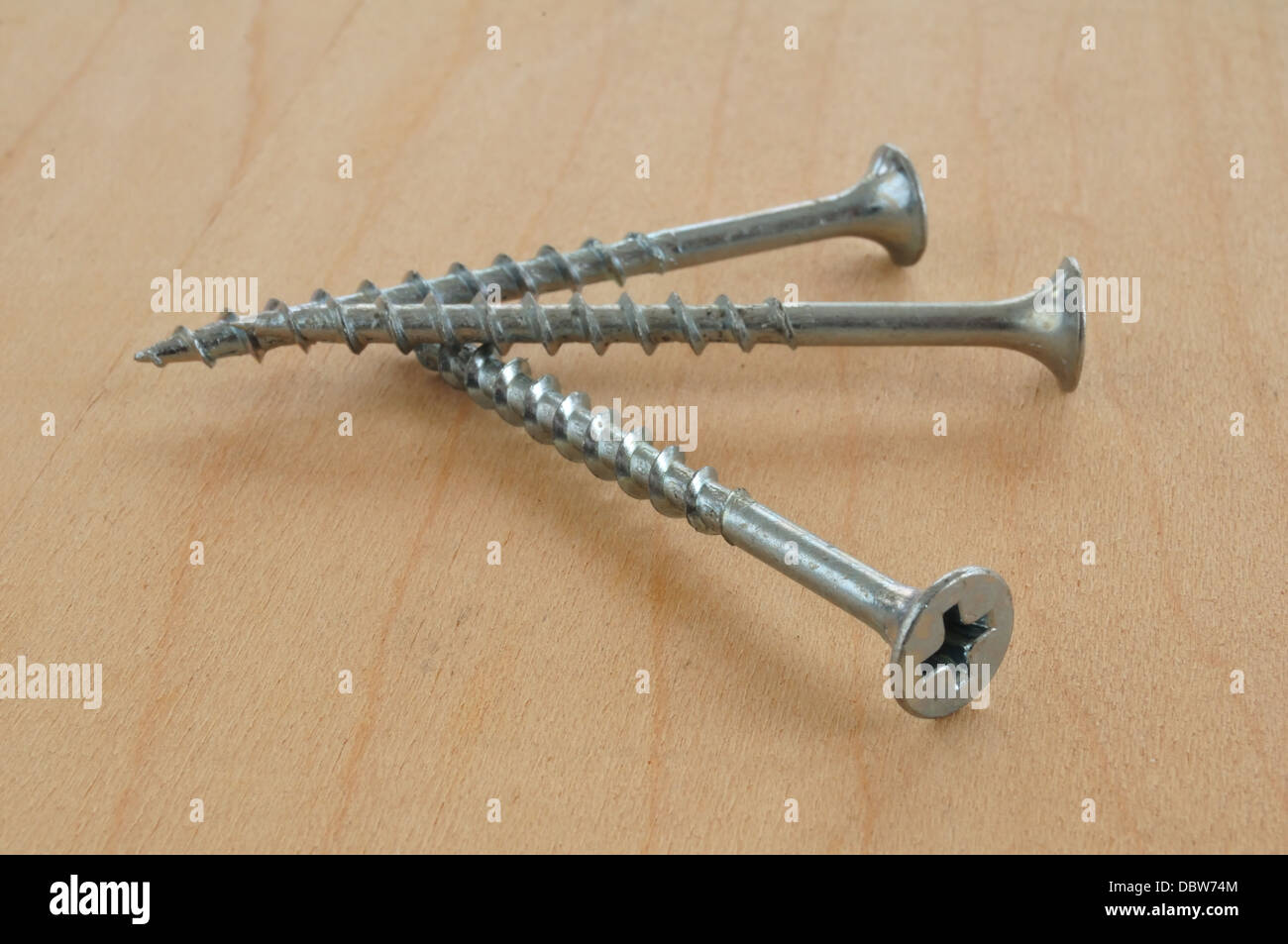 Three screws hi-res stock photography and images - Alamy