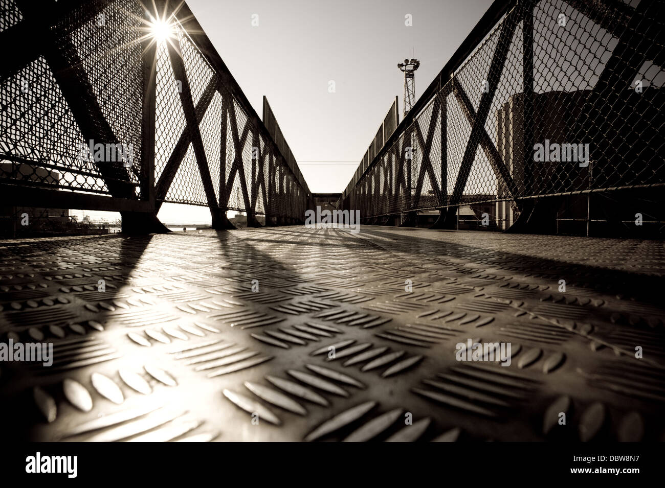 Metal bridge in urban location Stock Photo - Alamy