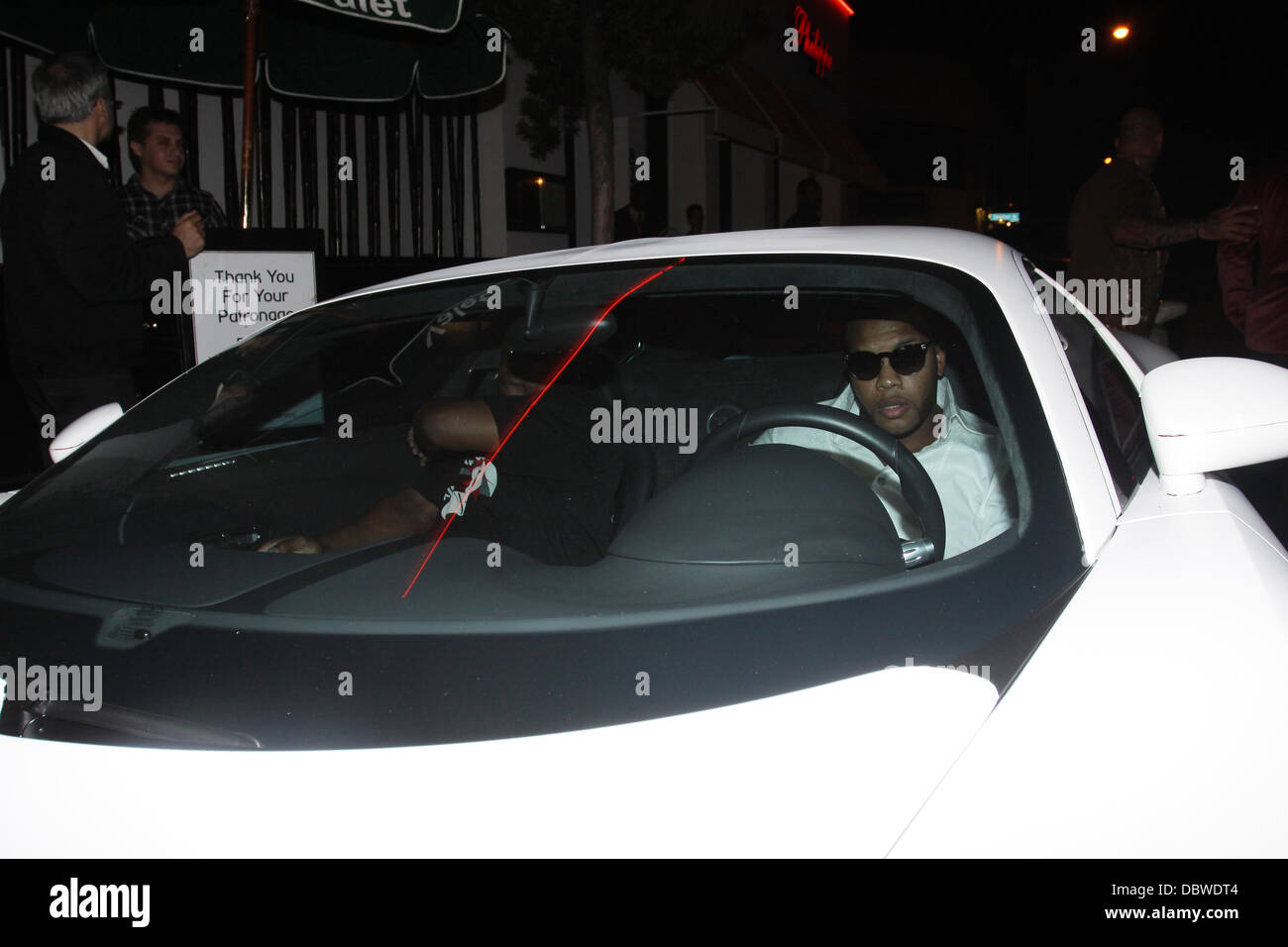 Rapper Flo Rida arrives at Philipe Chow restaurant in a white sports ...