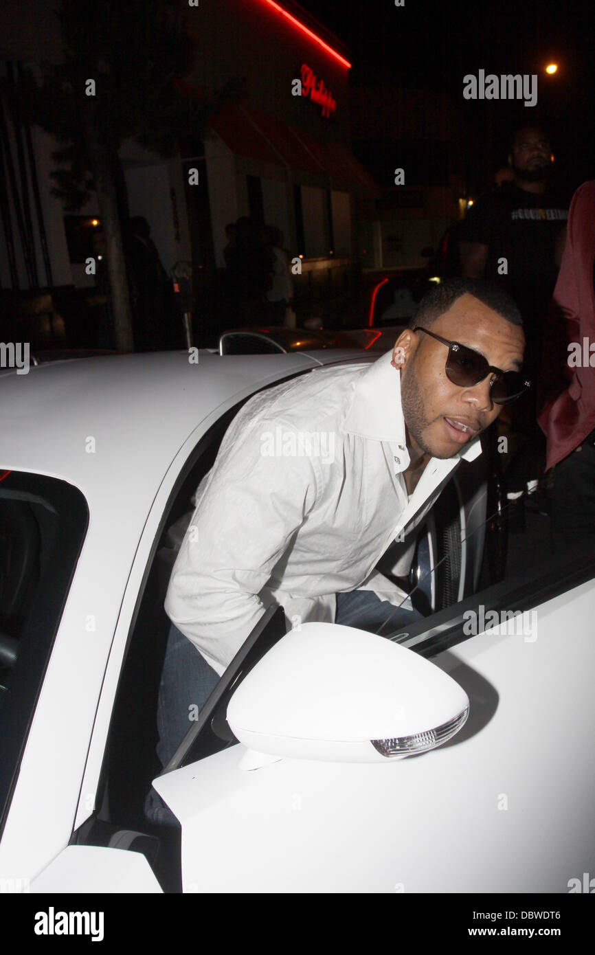 Rapper Flo Rida arrives at Philipe Chow restaurant in a white sports ...