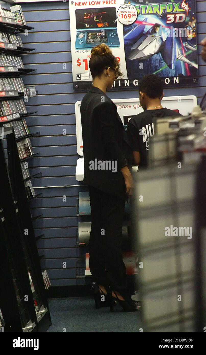 Rihanna and her younger brother Rajad visit The Grove in West Hollywood ...