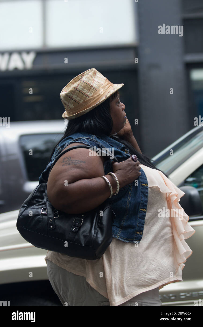 Obese lady profile outdoors Stock Photo - Alamy