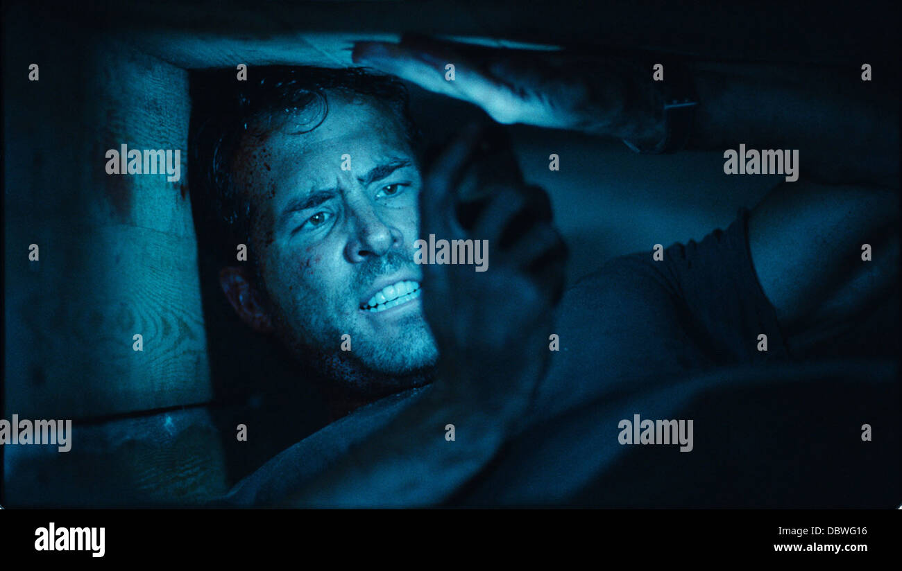 BURIED (2010) RYAN REYNOLDS RODRIGO CORTES (DIR) 009 MOVIESTORE ...