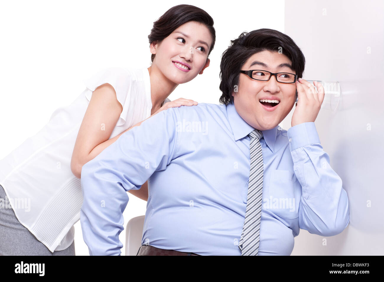 Business partner doing eavesdropping Stock Photo - Alamy