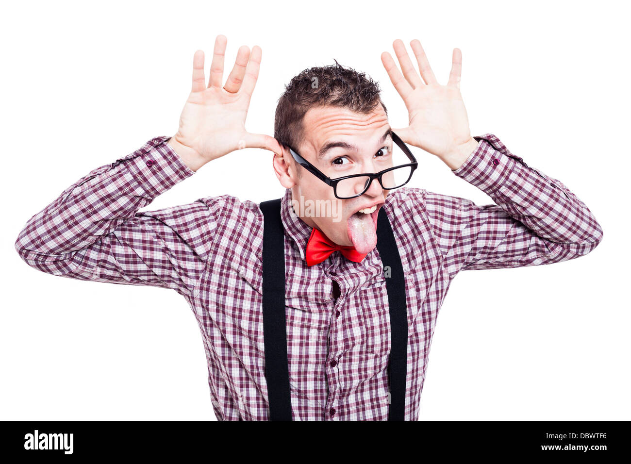 Eccentric nerd man making funny faces and sticking out tongue, isolated ...