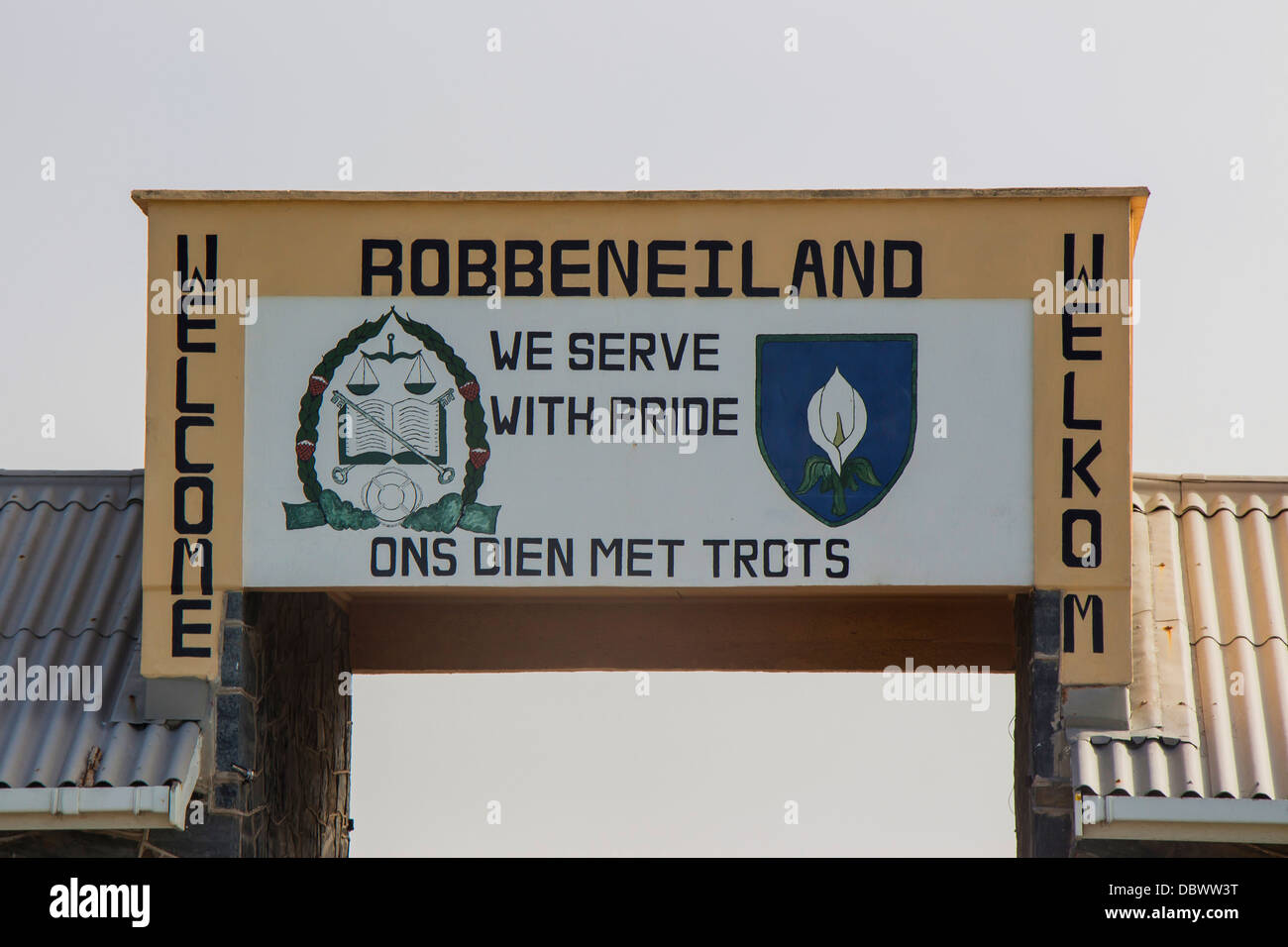 A close up of the "Welcome to Robben Island" sign at the harbor on the ...