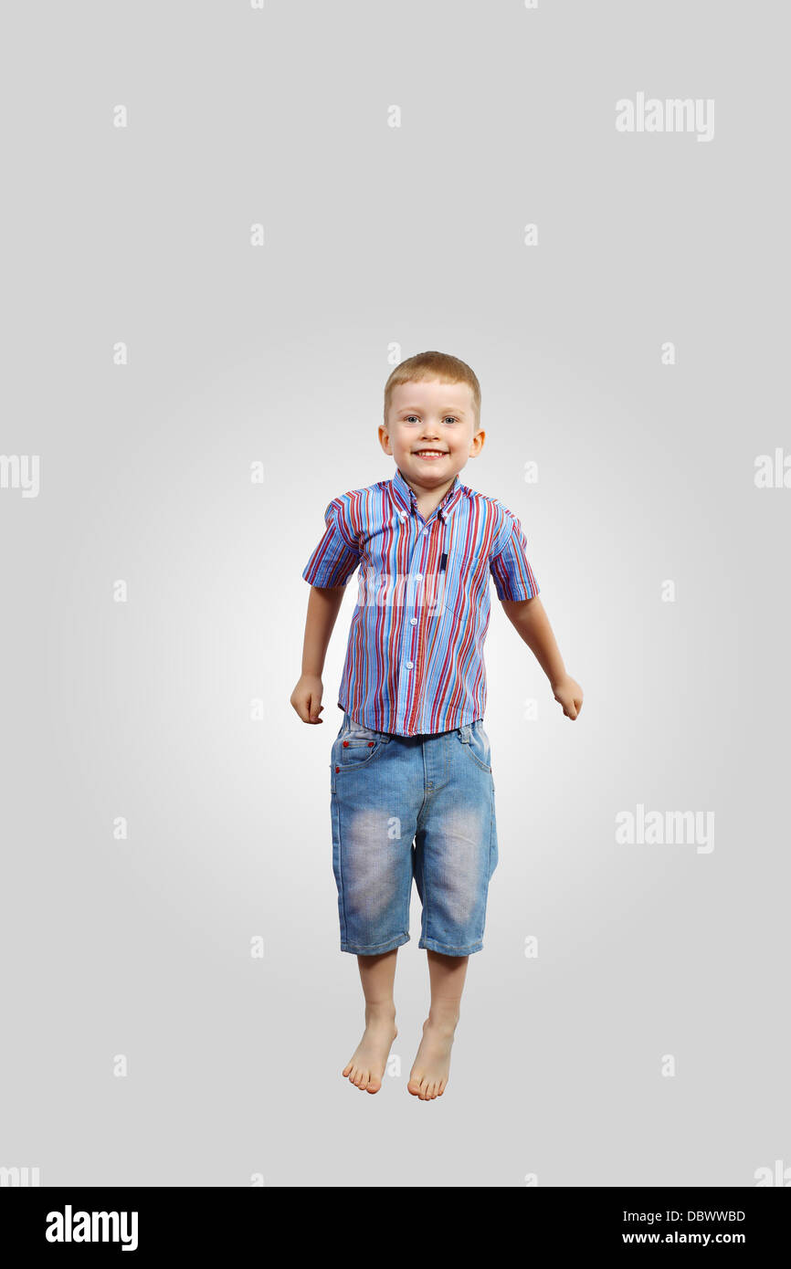 happy kid jumping Stock Photo - Alamy