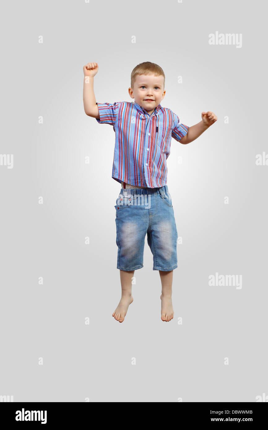 happy kid jumping Stock Photo - Alamy