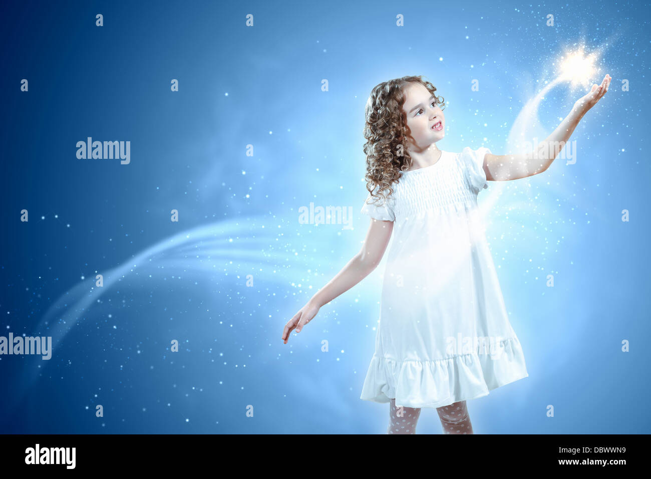 Child with magic light Stock Photo - Alamy