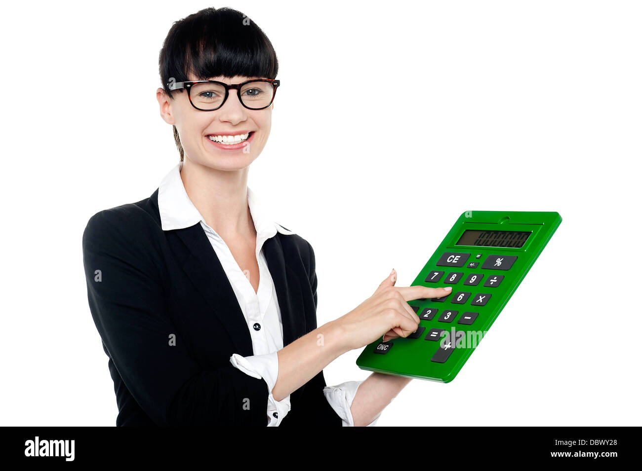 Bespectacled woman using big green calculator Stock Photo - Alamy