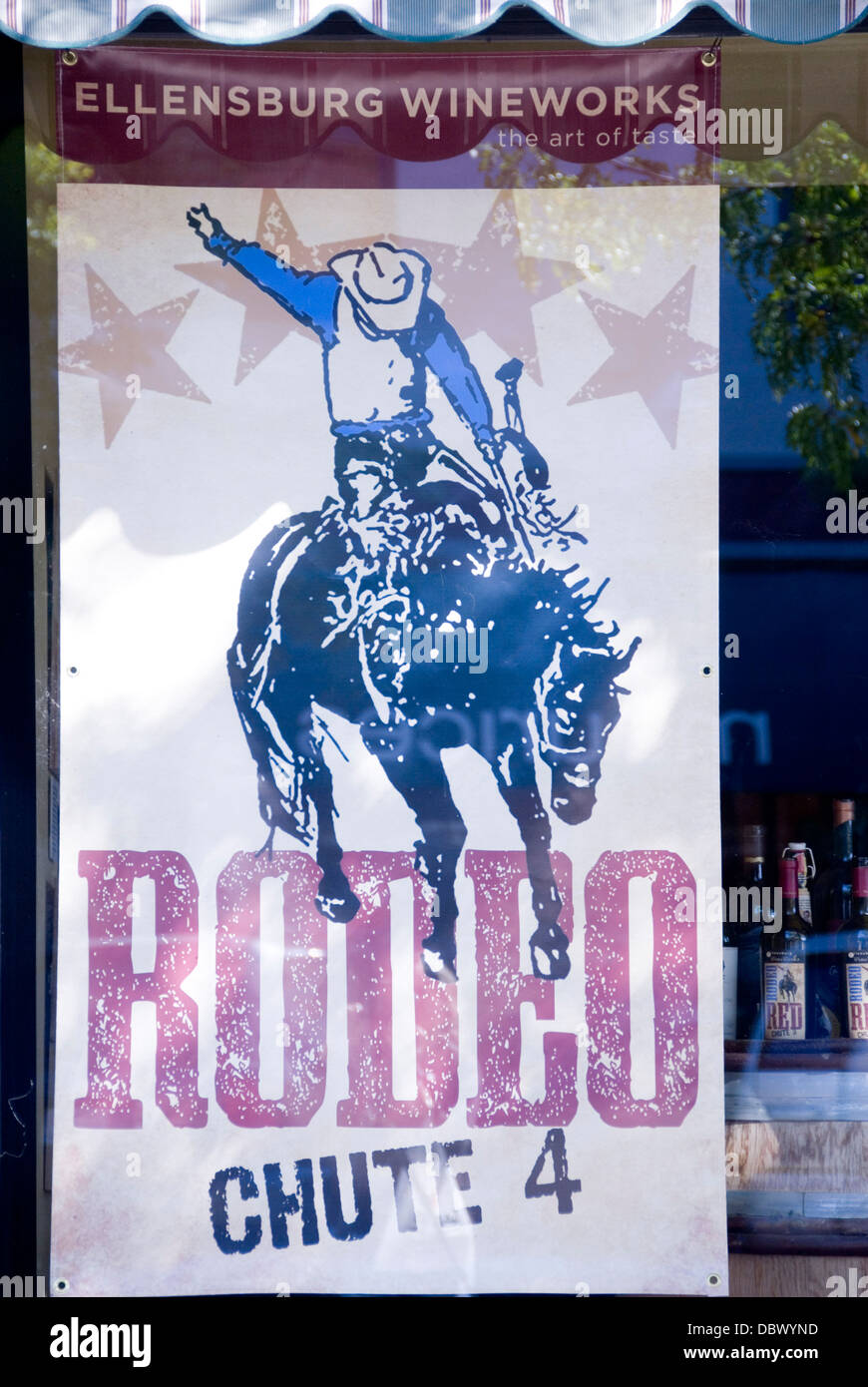 Poster advertising Rodeo in the window of the Ellensburg wineworks shop ...