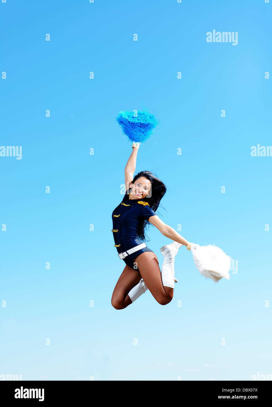 cheerleader girl jumping Stock Photo - Alamy