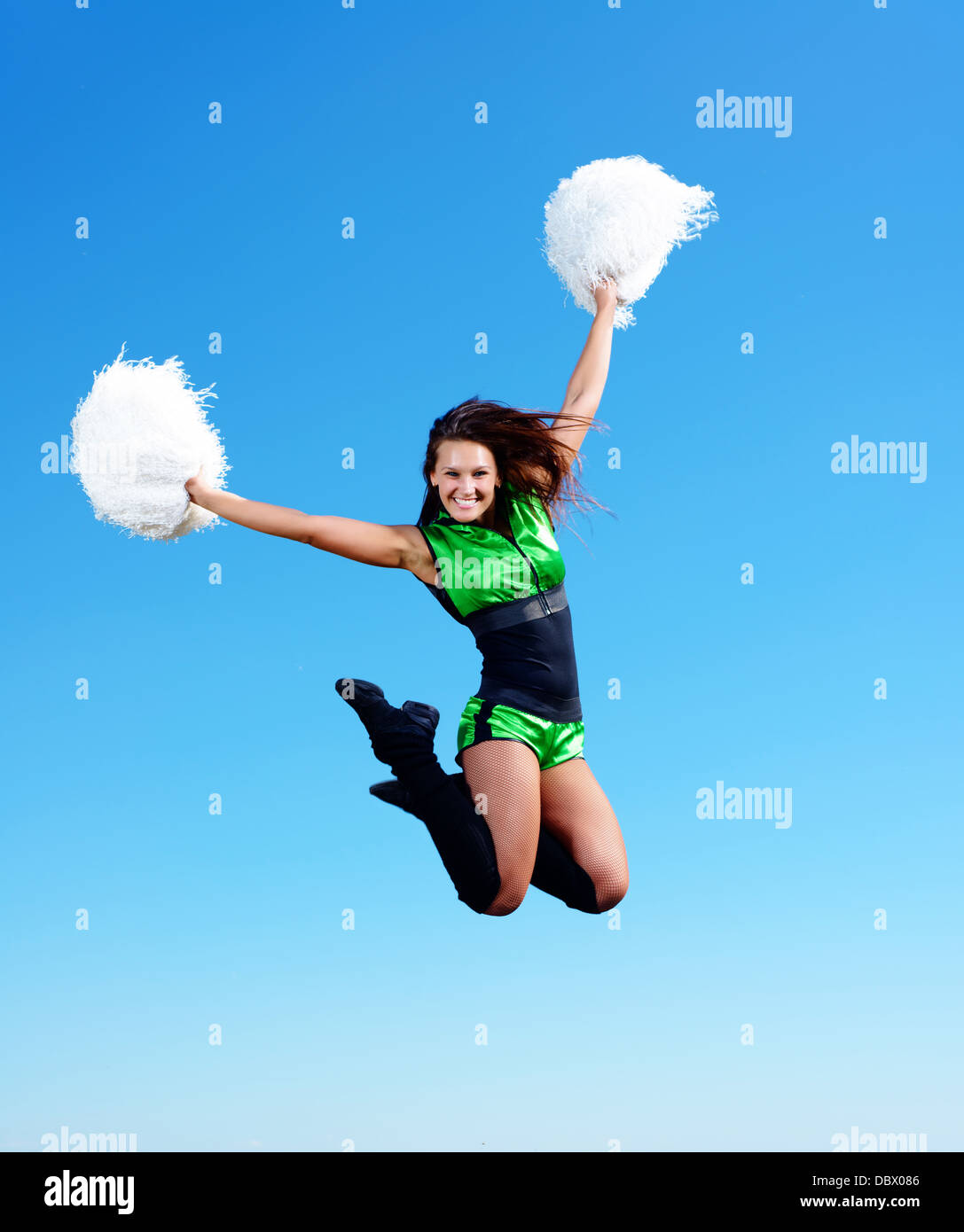 cheerleader girl jumping Stock Photo - Alamy