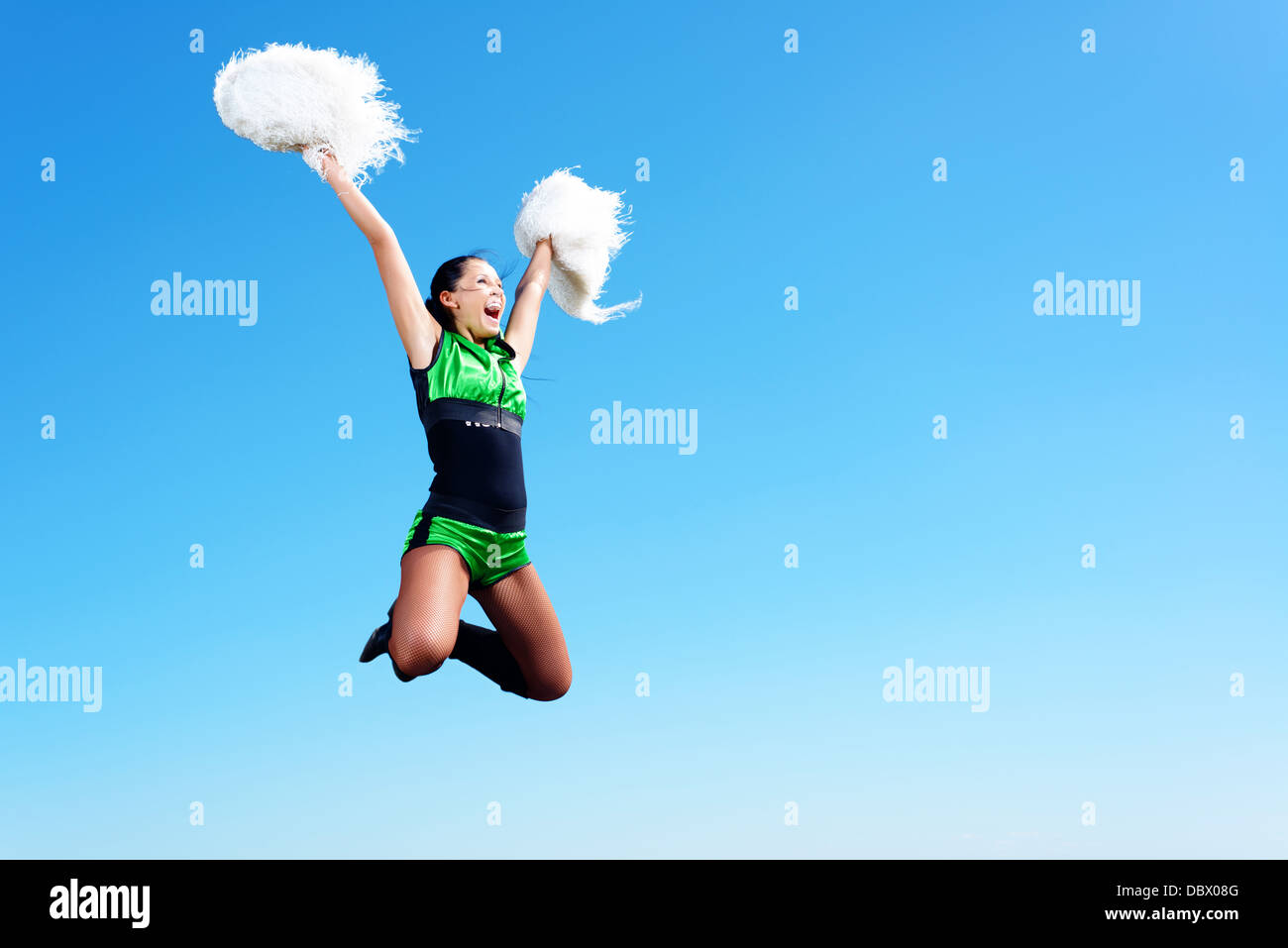 cheerleader girl jumping Stock Photo - Alamy