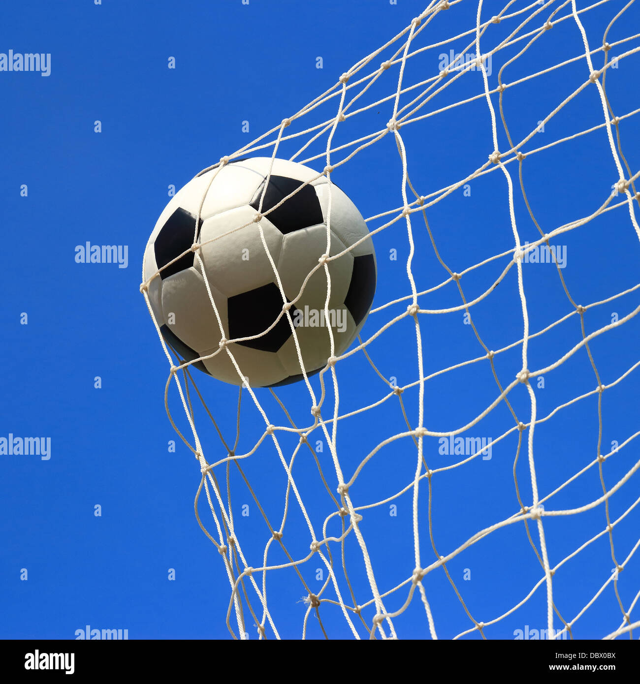 soccer ball in goal Stock Photo - Alamy