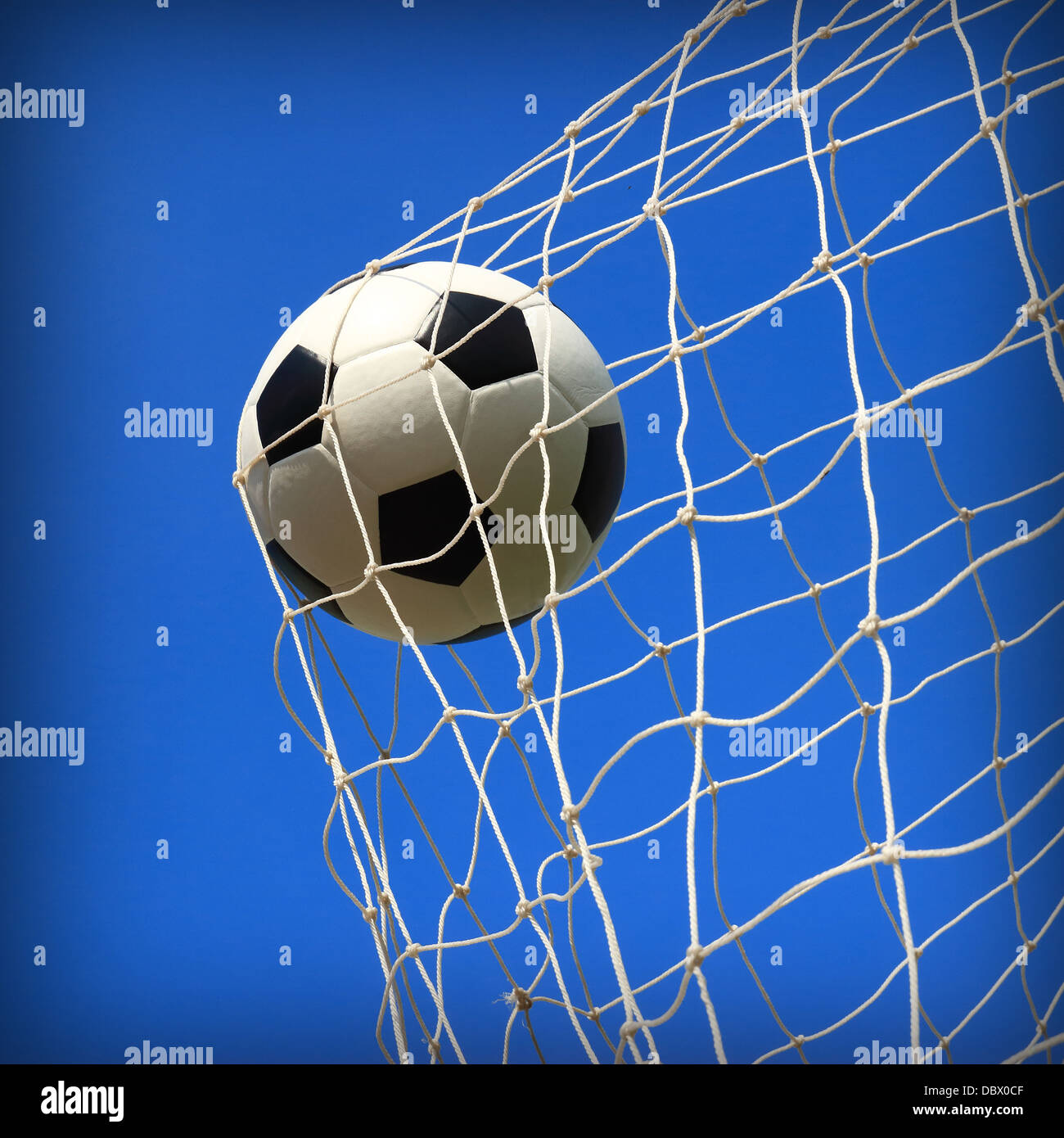 soccer ball in goal Stock Photo - Alamy