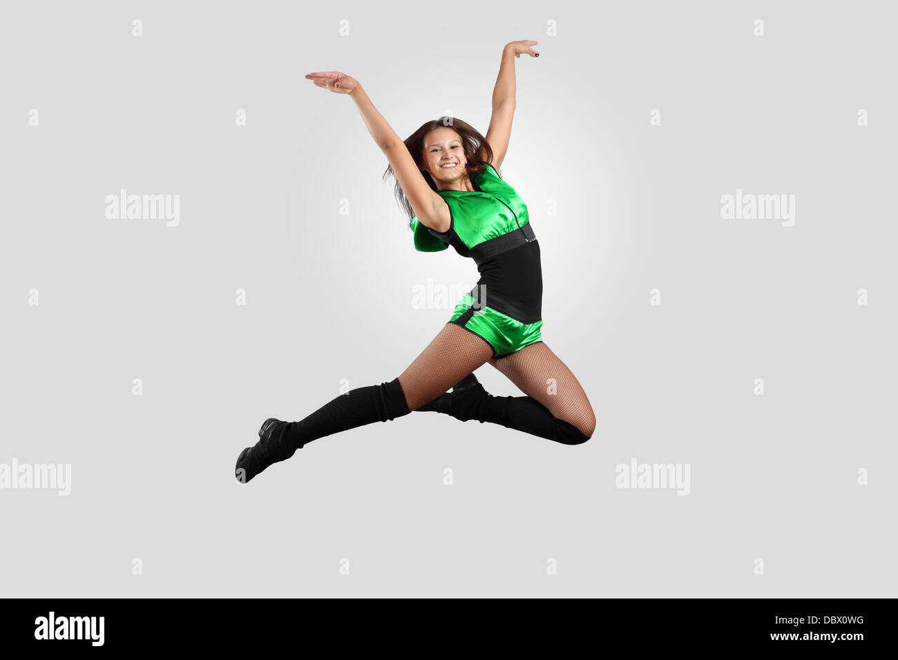 Young female dancer against white background Stock Photo - Alamy