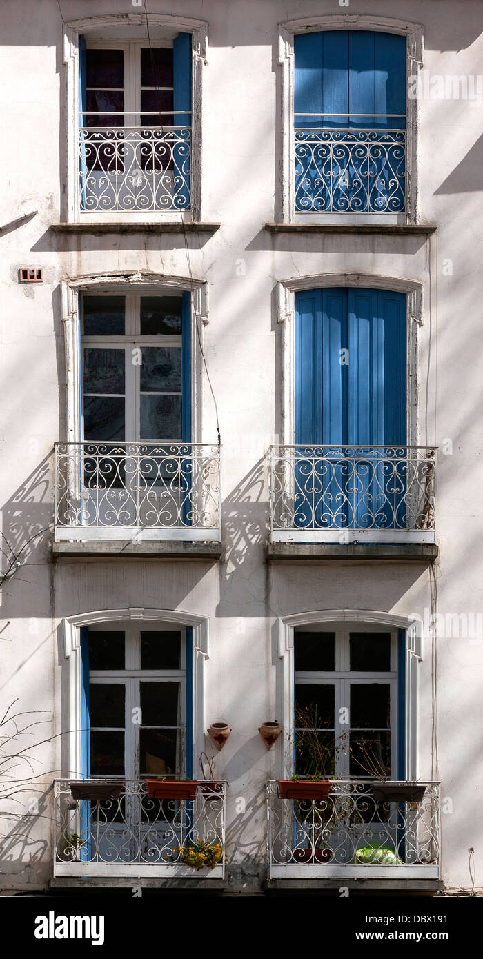 Old apartment windows in France Stock Photo - Alamy