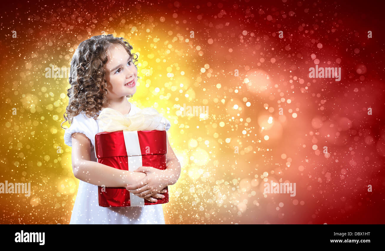 Happy girl opening gift box Stock Photo - Alamy