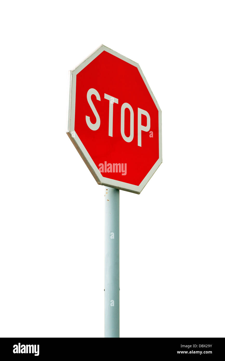 Red stop sign on the street, roadside traffic sign for stopping ...
