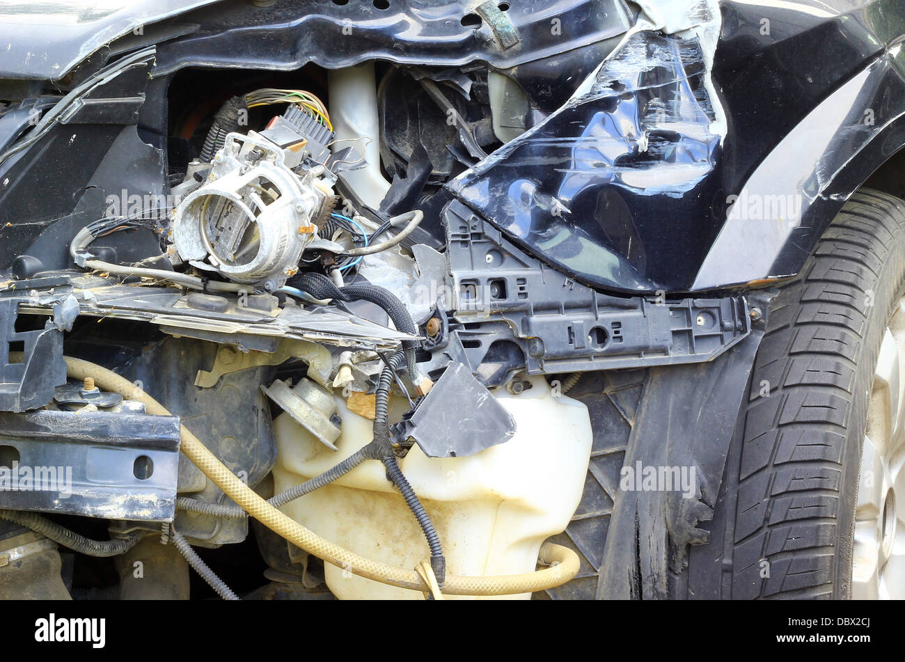 Crashed car close up. The front part is severely damaged Stock Photo ...