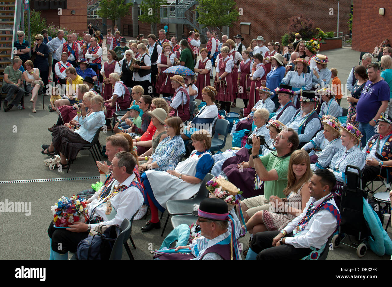 People sat watching hi-res stock photography and images - Alamy